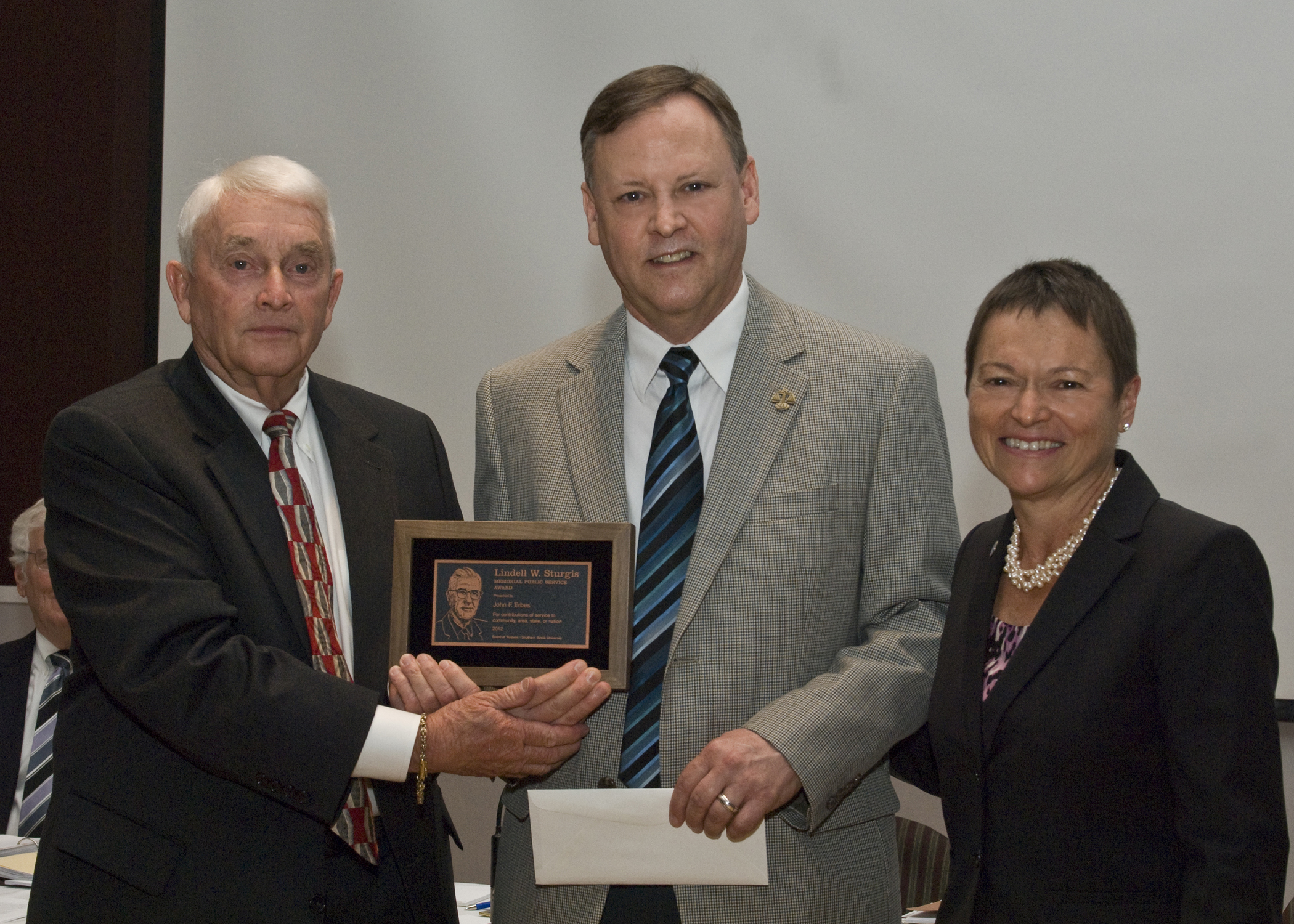 Erbes presented with Sturgis public service award